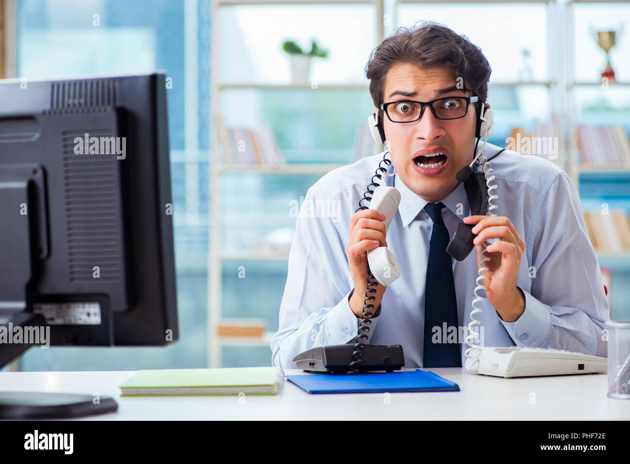 Call centre worker angry hi-res stock photography and images - Alamy