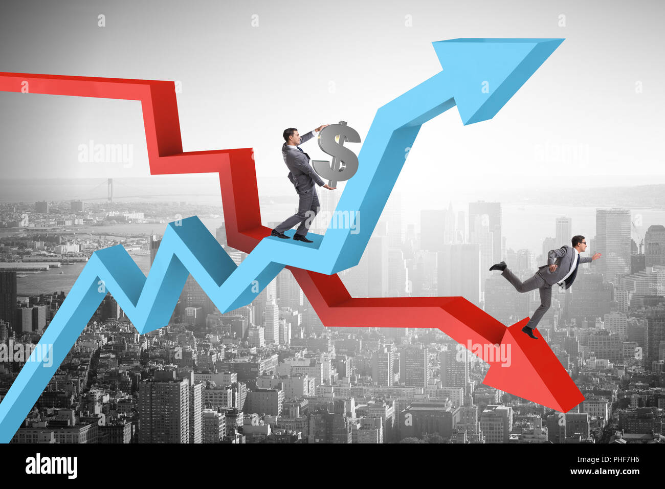 Businessman with charts of growth and decline Stock Photo - Alamy