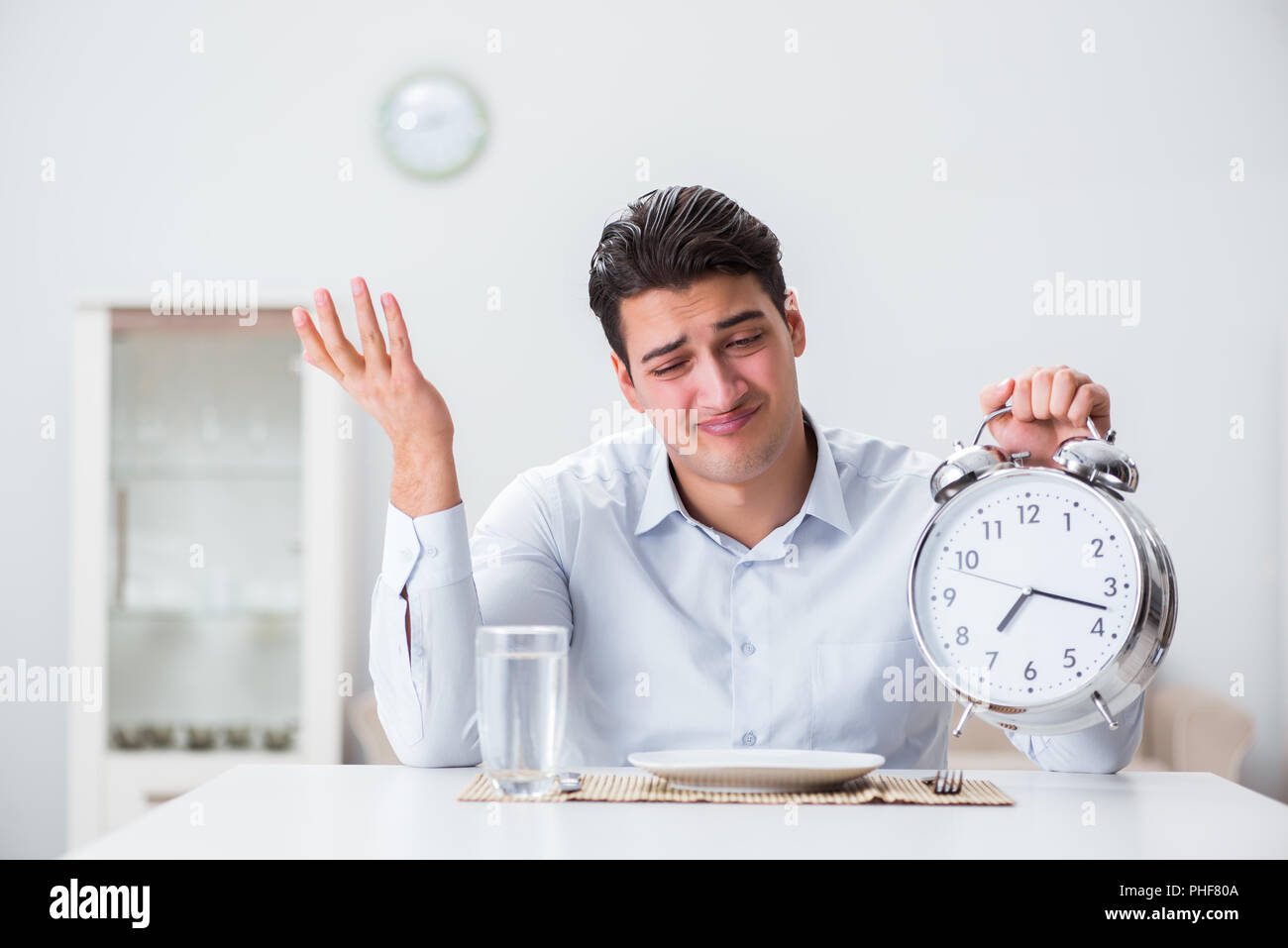 Angry man waiting food in hi-res stock photography and images - Alamy