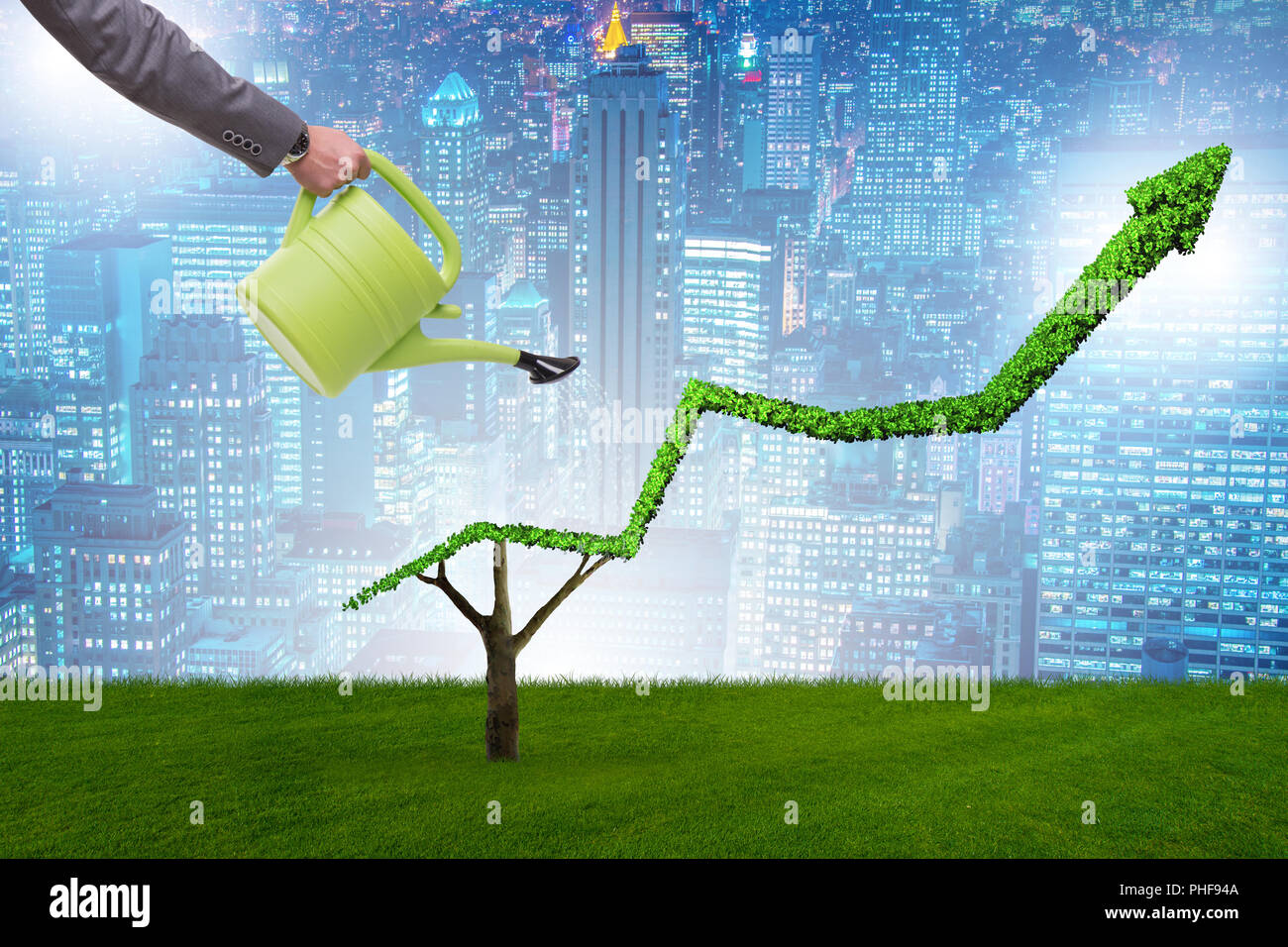 Businessman in investment concept watering financial line chart Stock ...