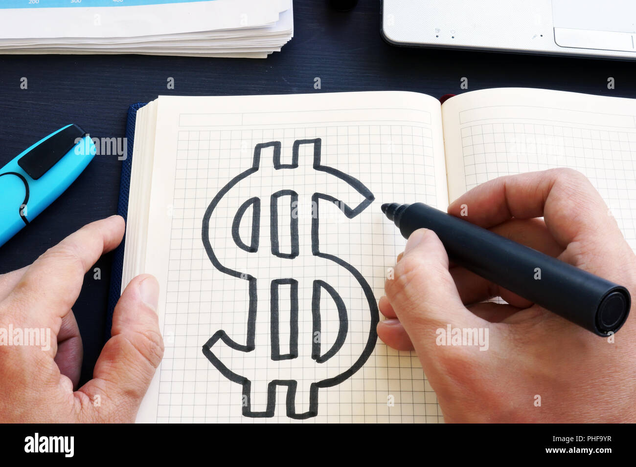 Dollar sign handwritten in the note. Profit and wealth Stock Photo - Alamy