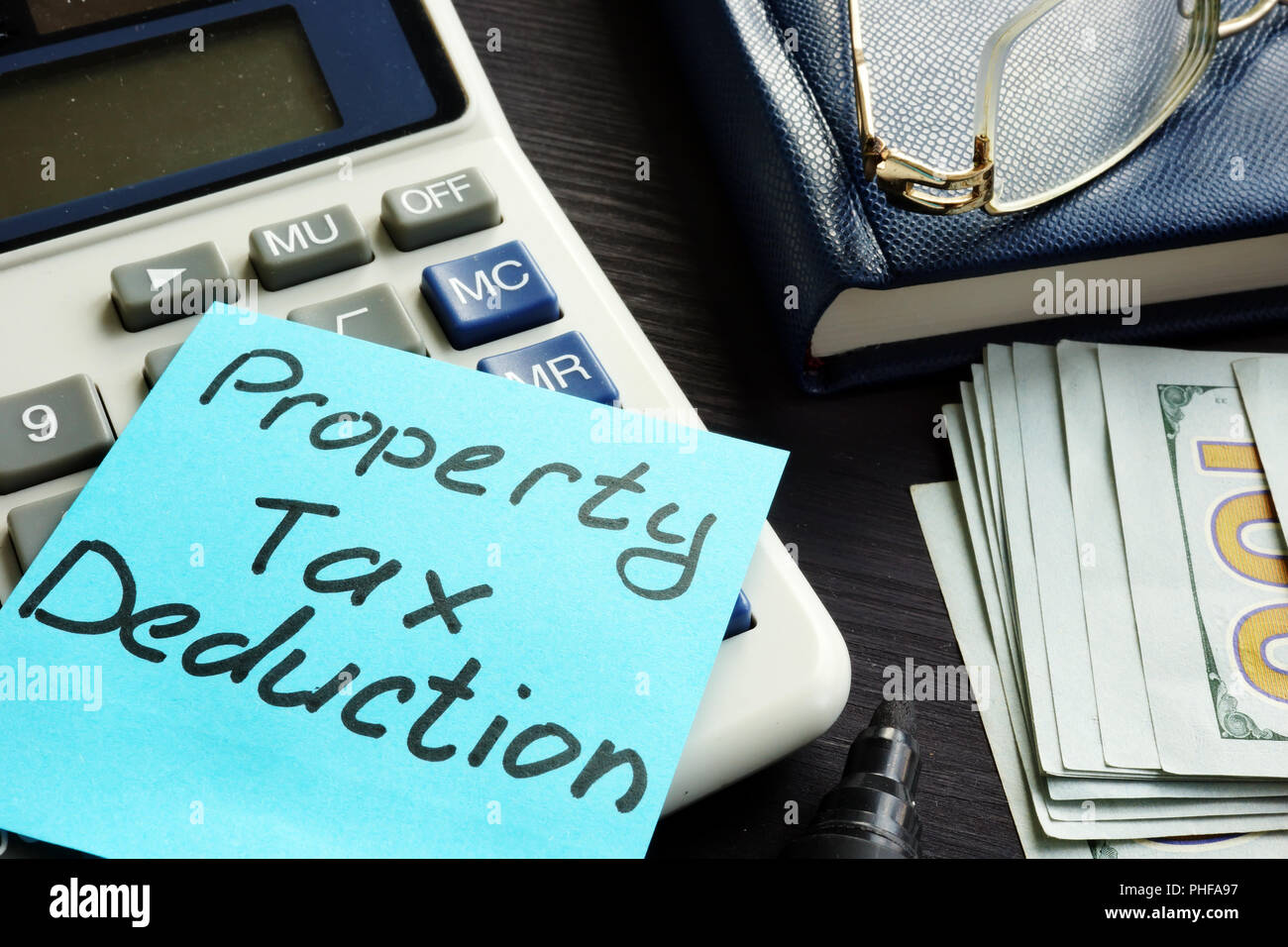 Income tax deduction hi-res stock photography and images - Alamy