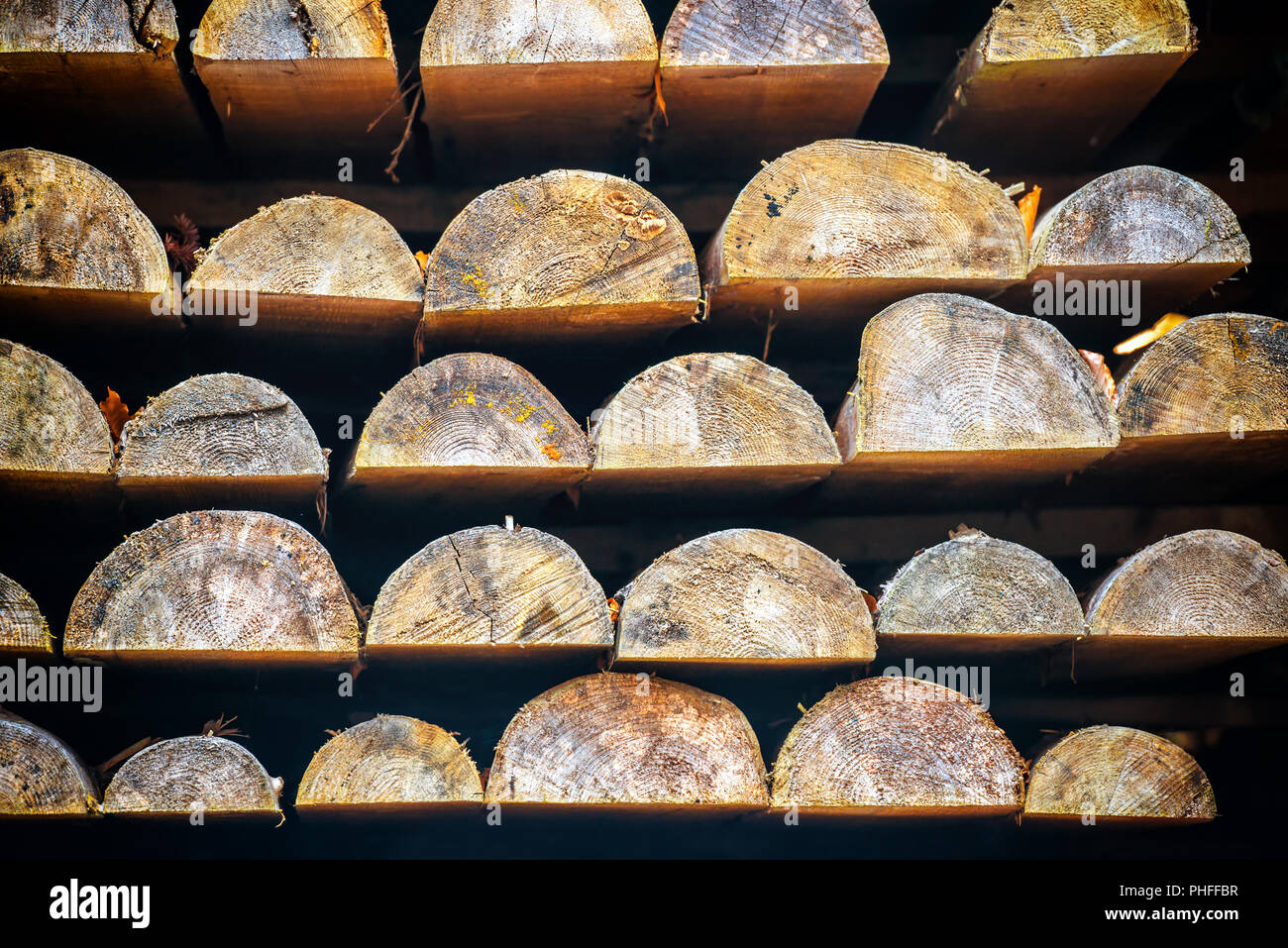 Rows of wooden logs Stock Photo - Alamy