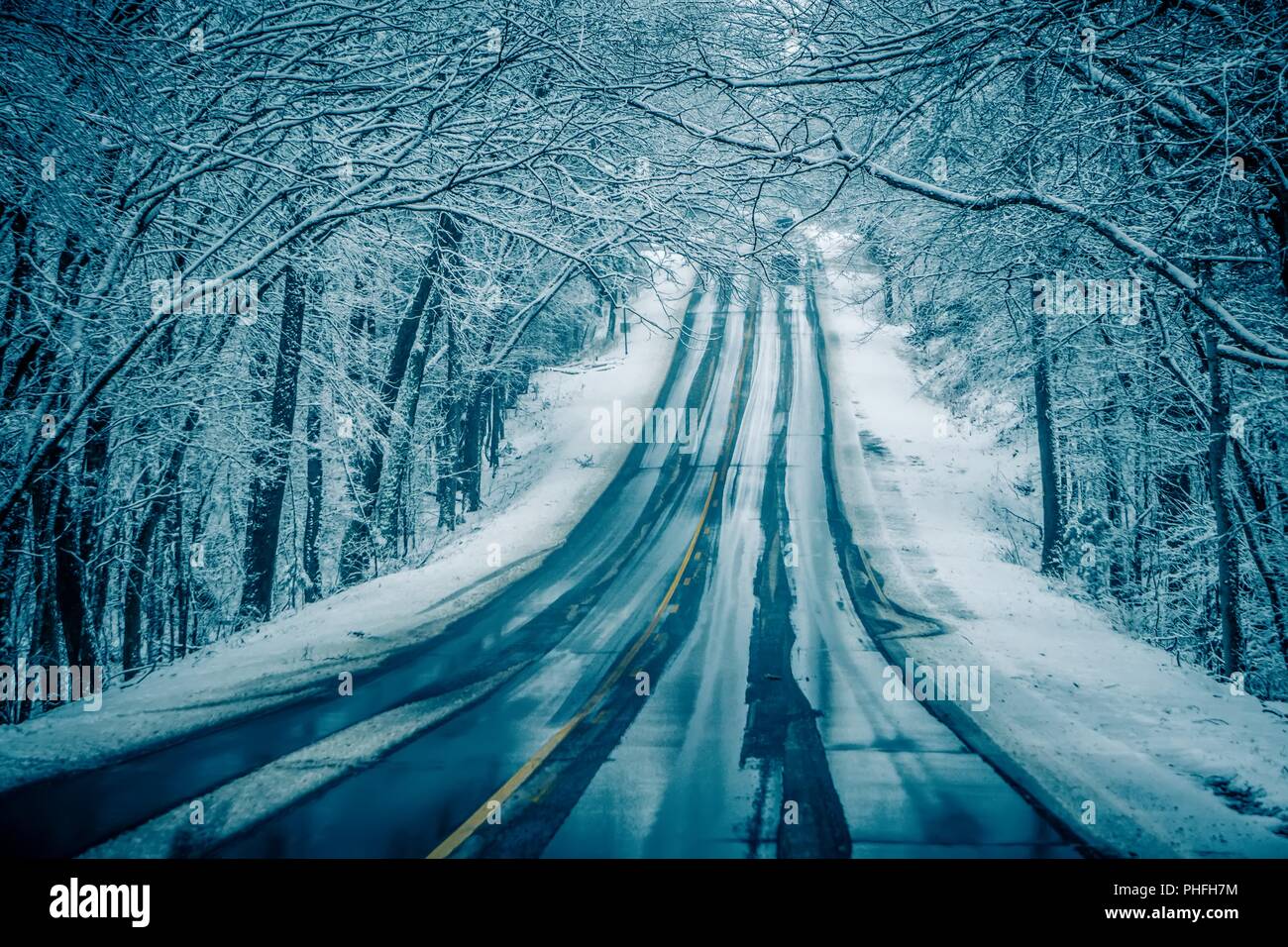 bad conditions snow covered winter road in south carolina Stock Photo ...