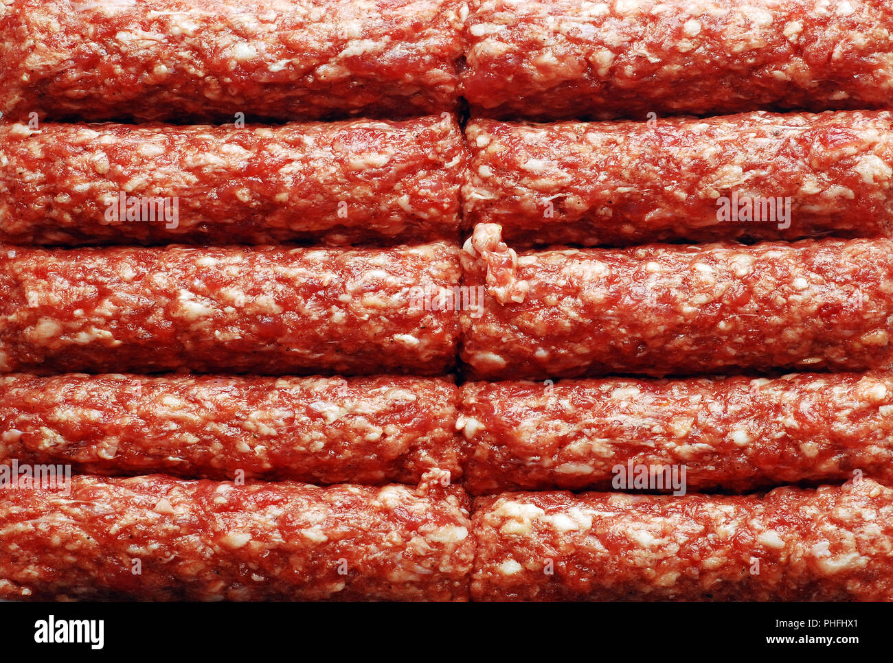 grounded raw pork meat background Stock Photo - Alamy