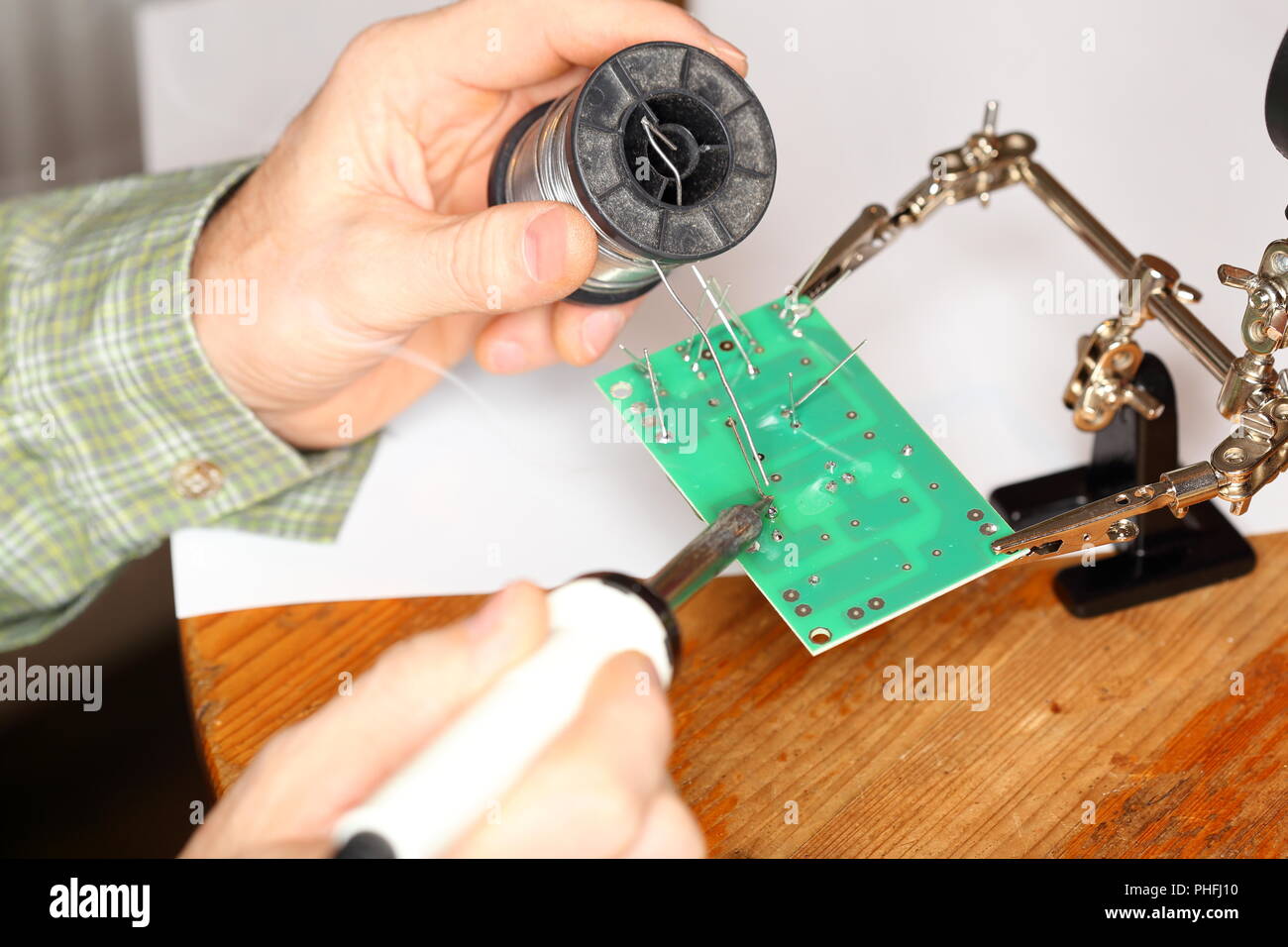 Fixing components hi-res stock photography and images - Alamy