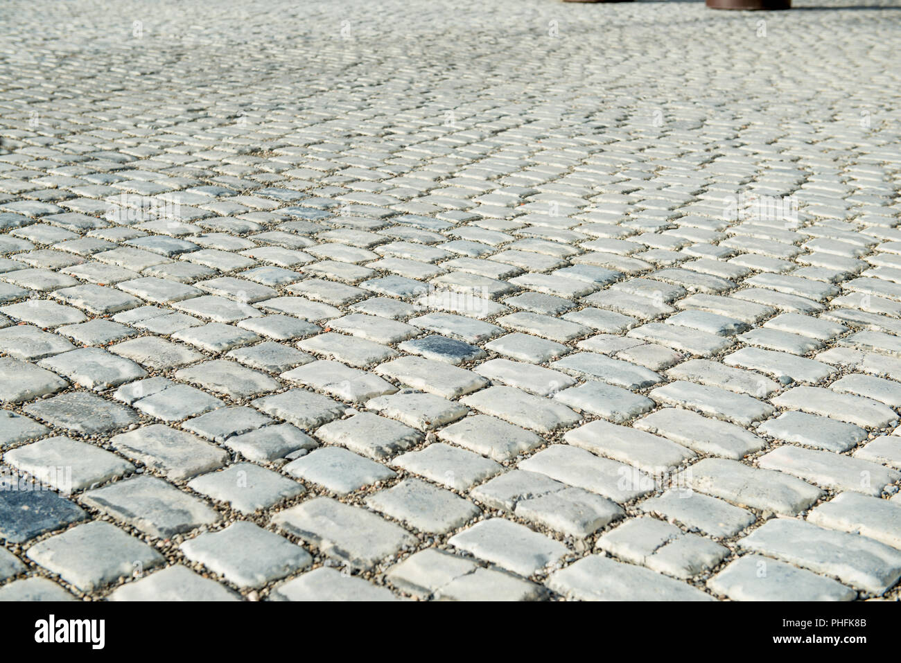 Road paved with cobble stones for your background Stock Photo - Alamy