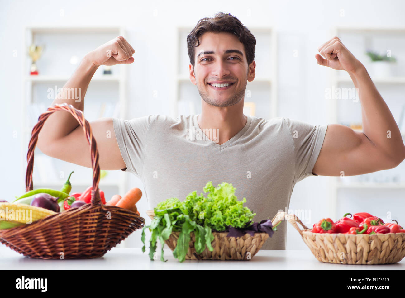 Man eating vegetable muscular hi-res stock photography and images - Alamy