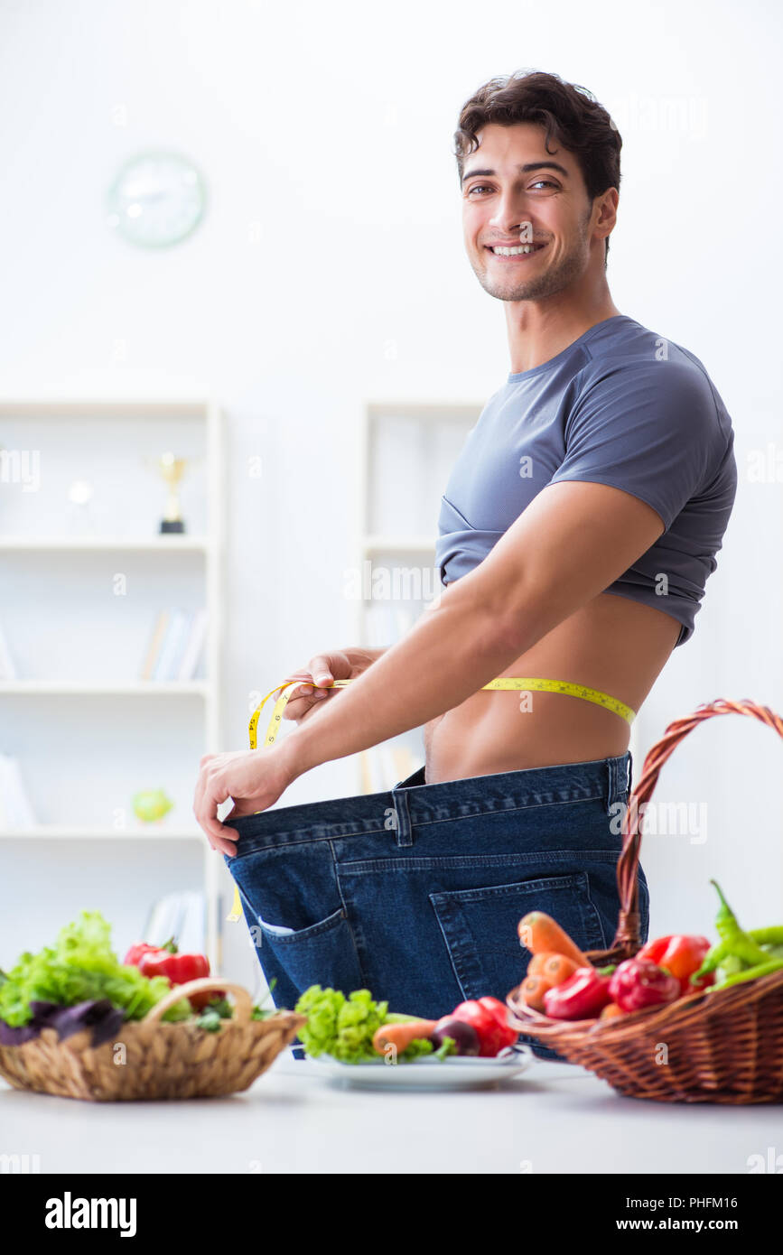 Young man in healthy eating and dieting concept Stock Photo - Alamy