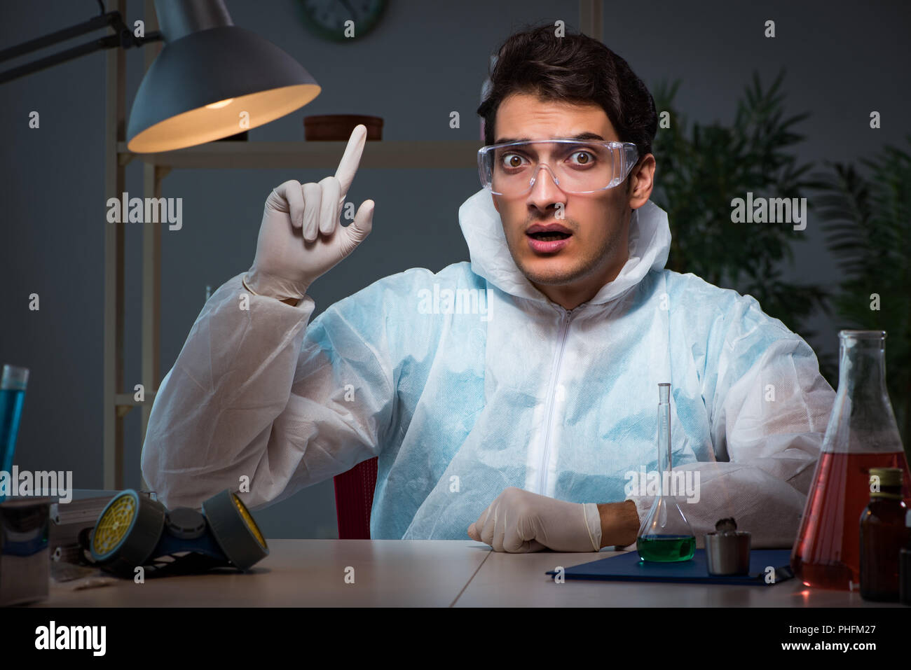 Young male chemist late hi-res stock photography and images - Alamy