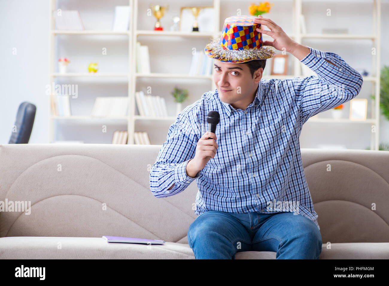 Funny man singing songs in karaoke at home Stock Photo - Alamy