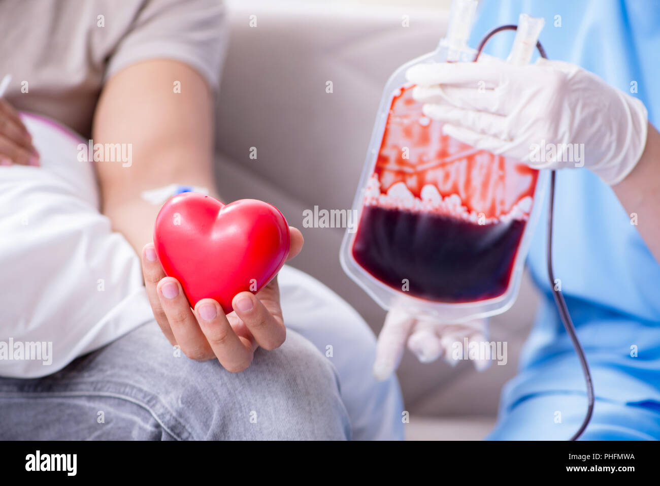 Patient getting blood transfusion in hospital clinic Stock Photo - Alamy
