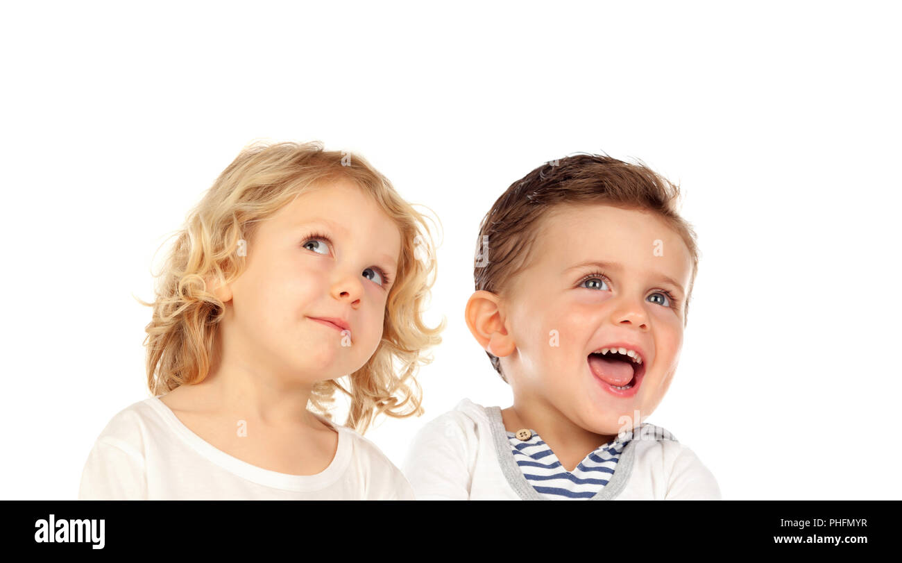 Two blond children looking up isolated on a white backround Stock Photo ...
