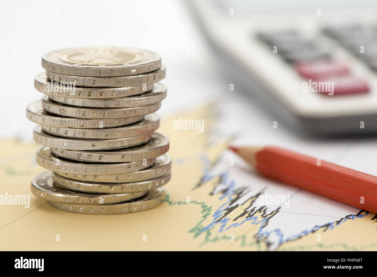 stacked euro coins with data and chart of exchange market Stock Photo ...