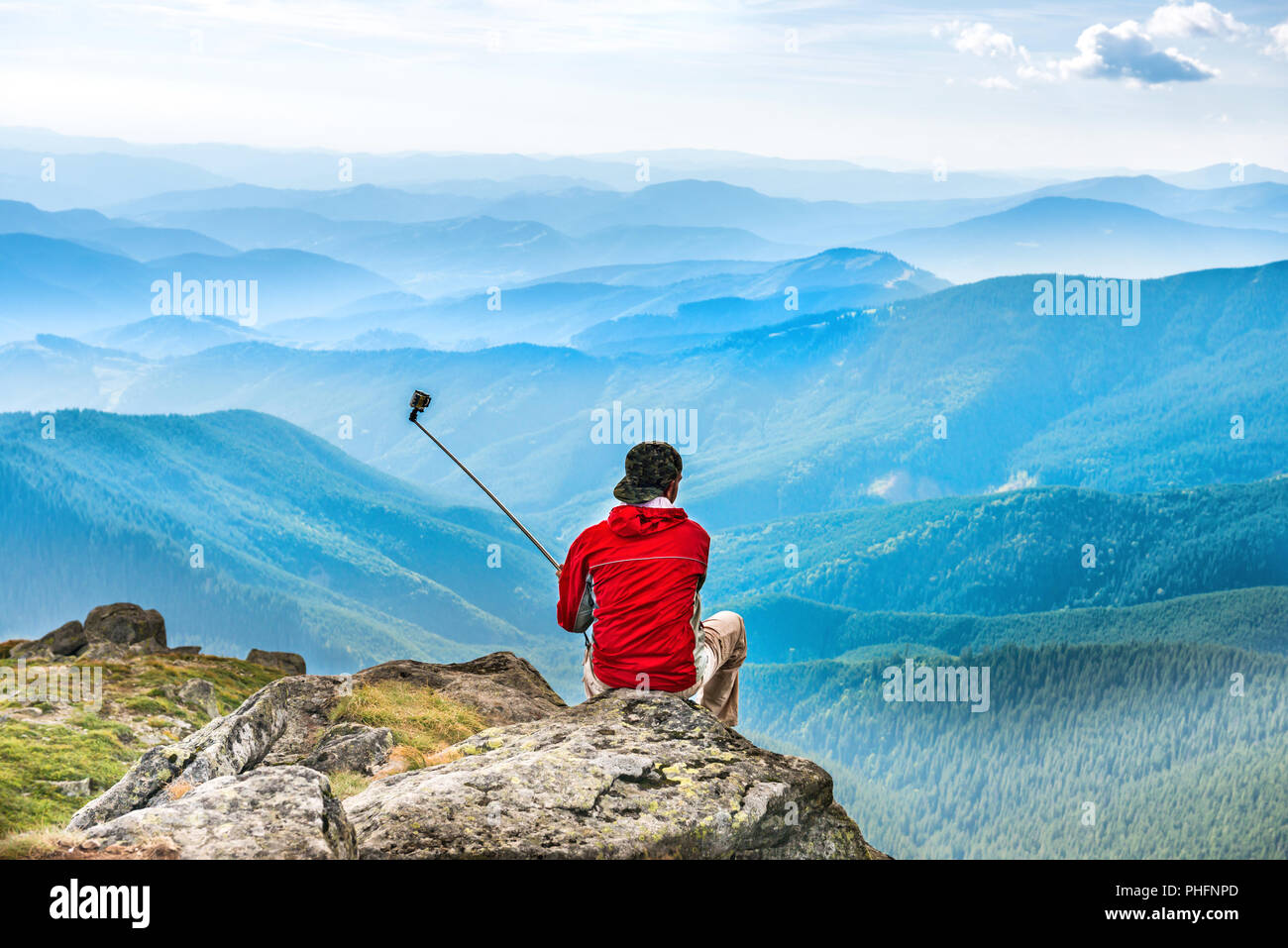 Young man mountain hi-res stock photography and images - Alamy