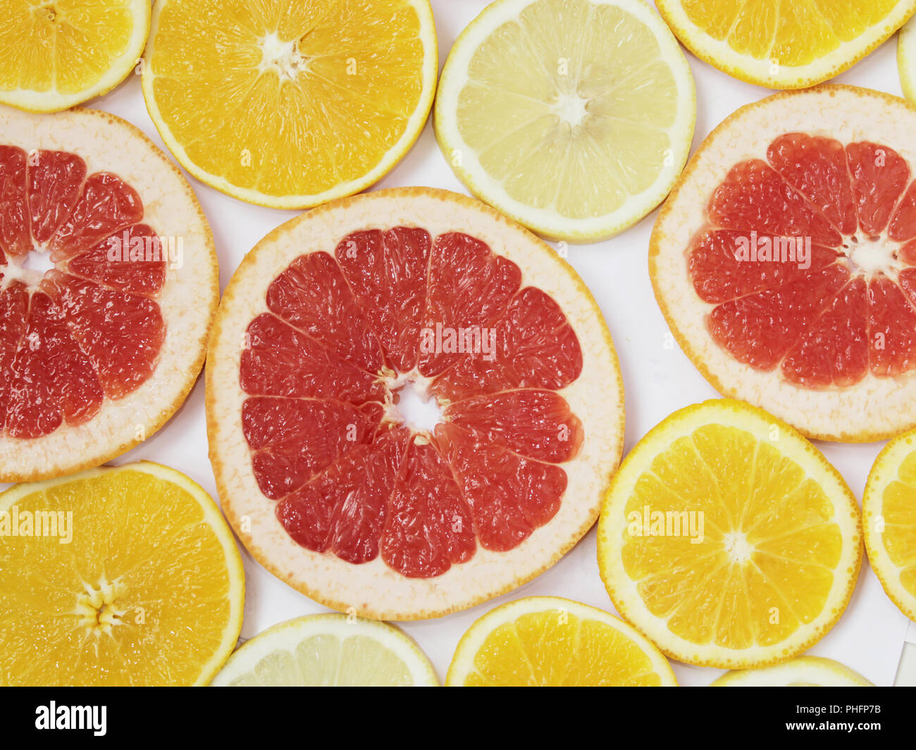 citrus pattern of orange and grapefruit slices. Colored citrus pattern ...