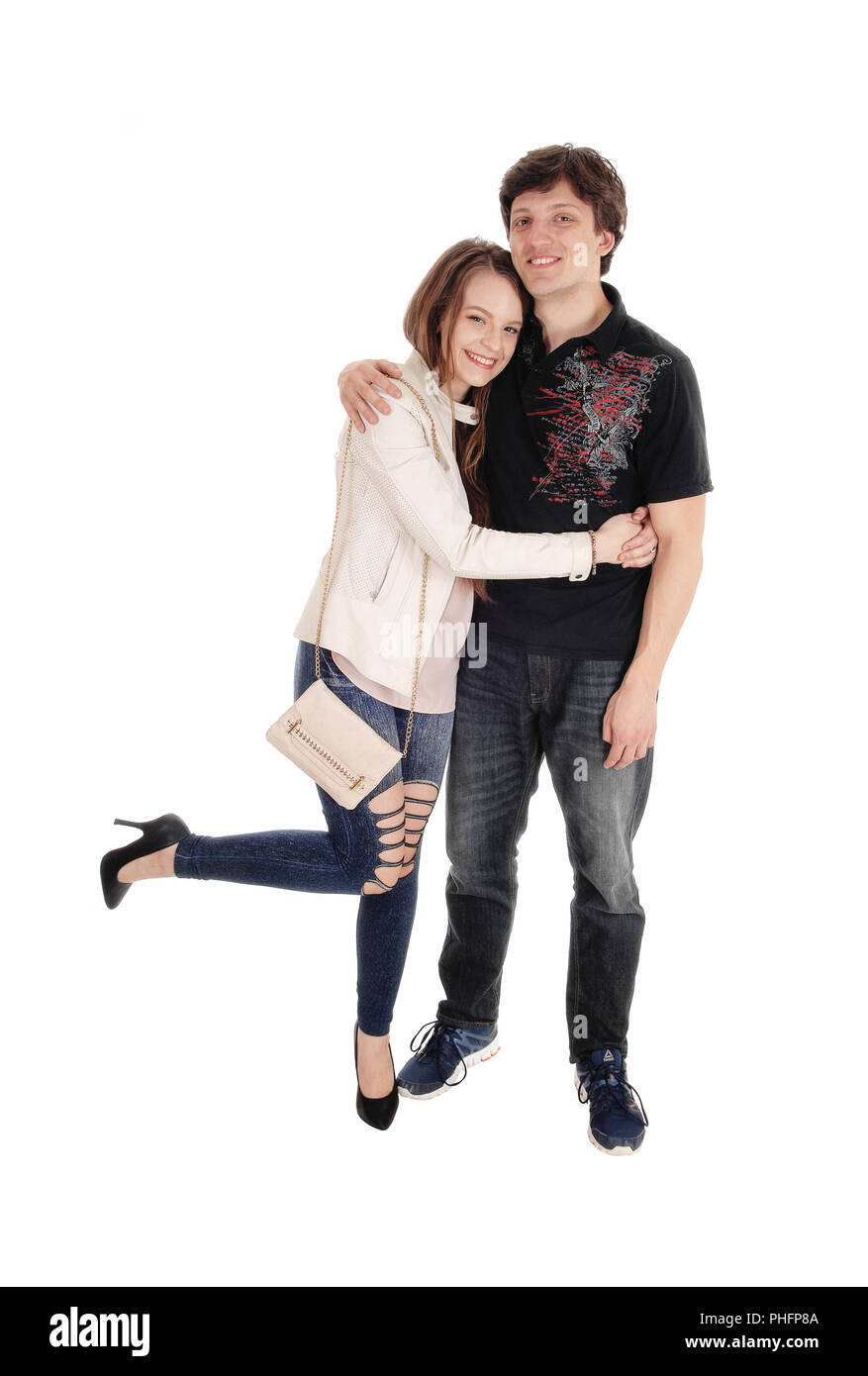 Beautiful young couple hugging Stock Photo - Alamy