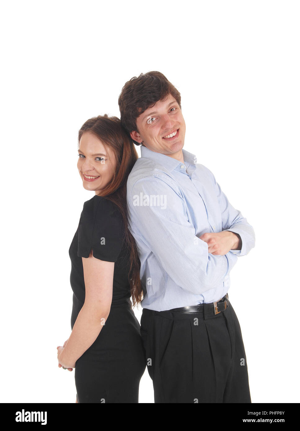 Closeup two people standing back Cut Out Stock Images & Pictures - Alamy