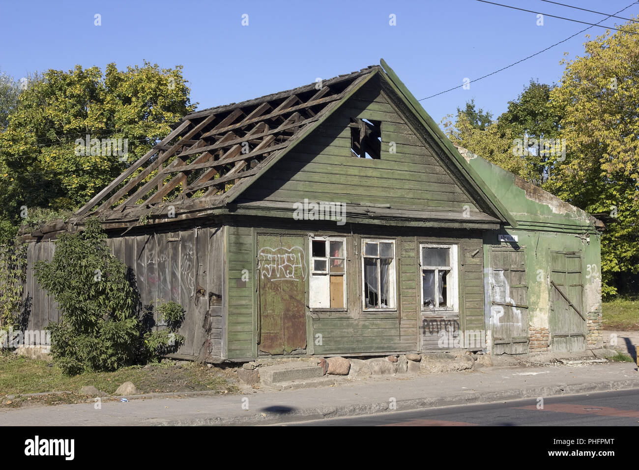 Rotten destroyed old wooden house Stock Photo - Alamy