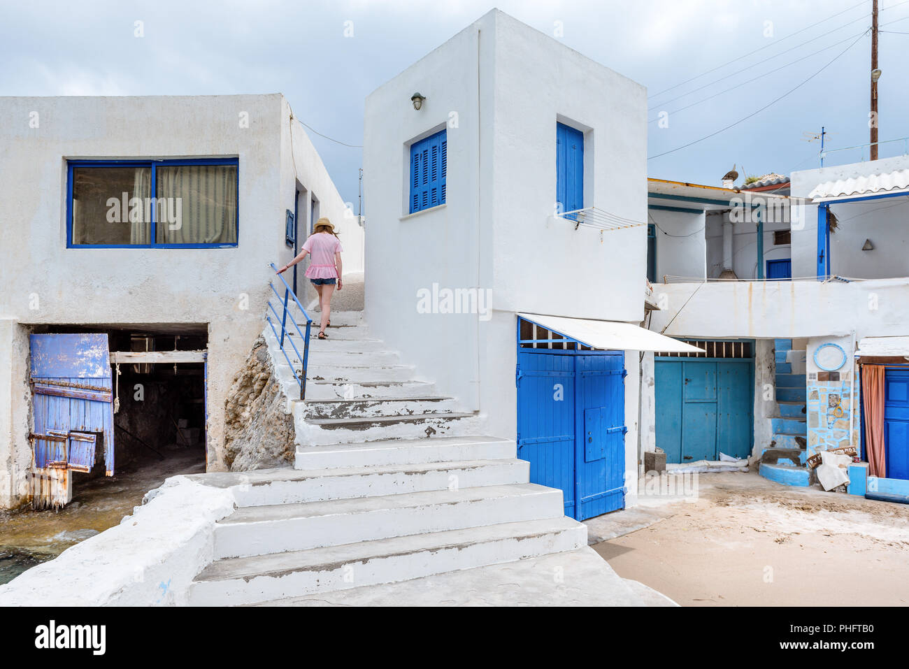 Blue and white architecture in Firopotamos, a fishing port on Milos ...