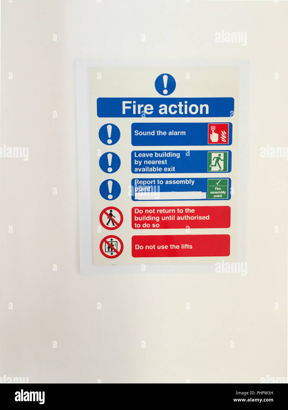 Fire action office workplace safety rules information Stock Photo - Alamy