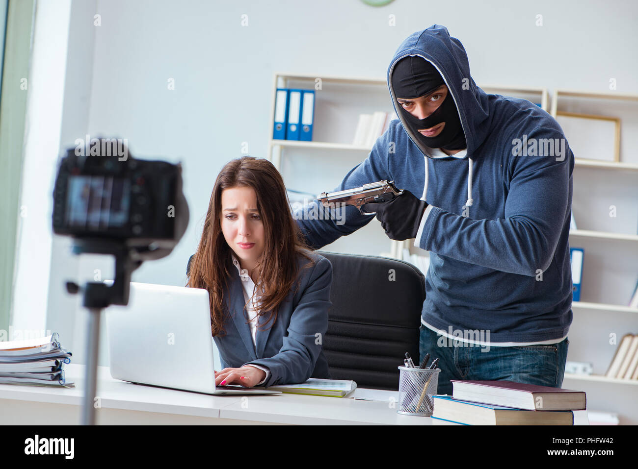 Criminal recording message for ransom with victim businesswoman Stock ...