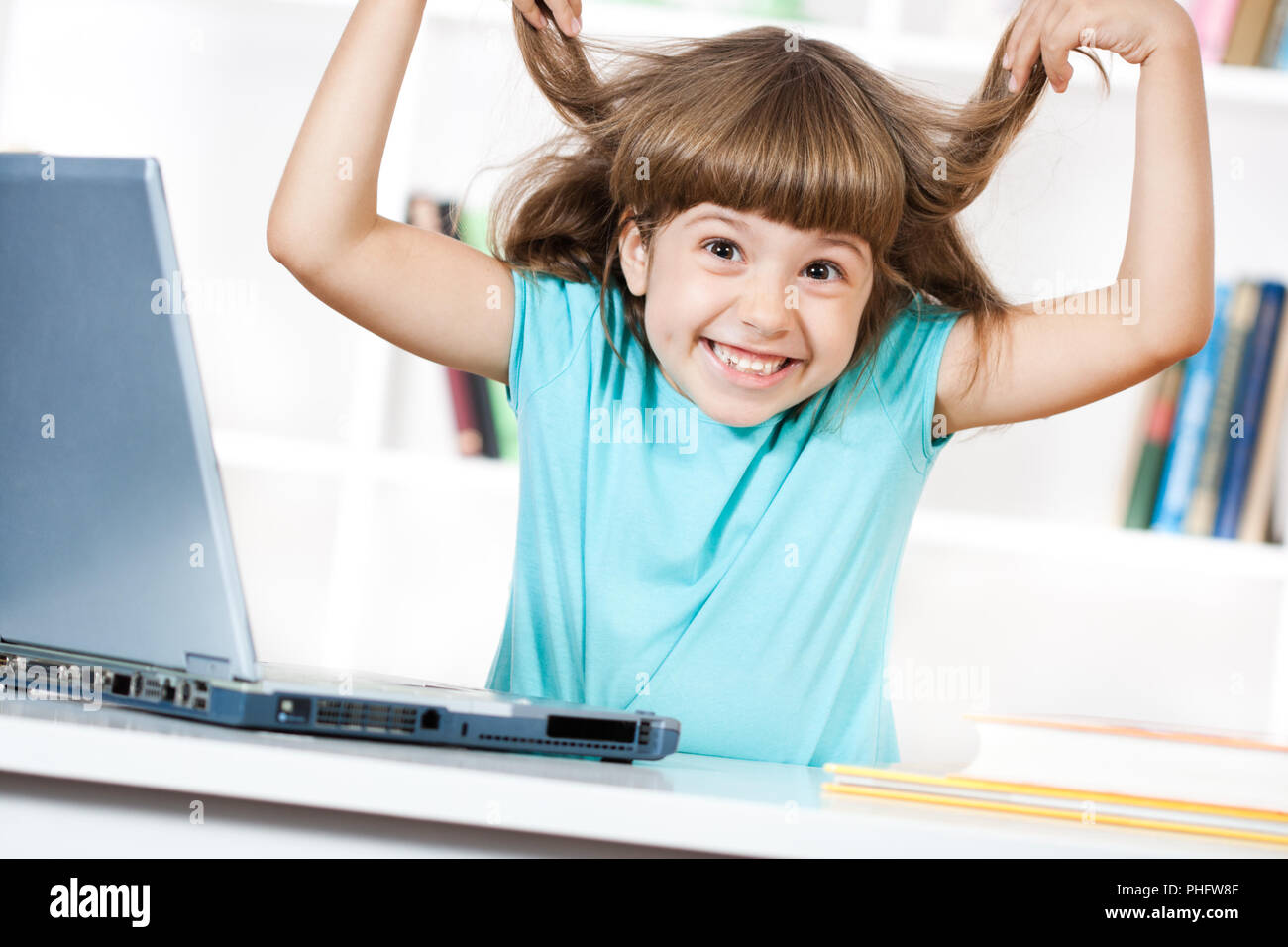 Cute little girl having fun Stock Photo - Alamy