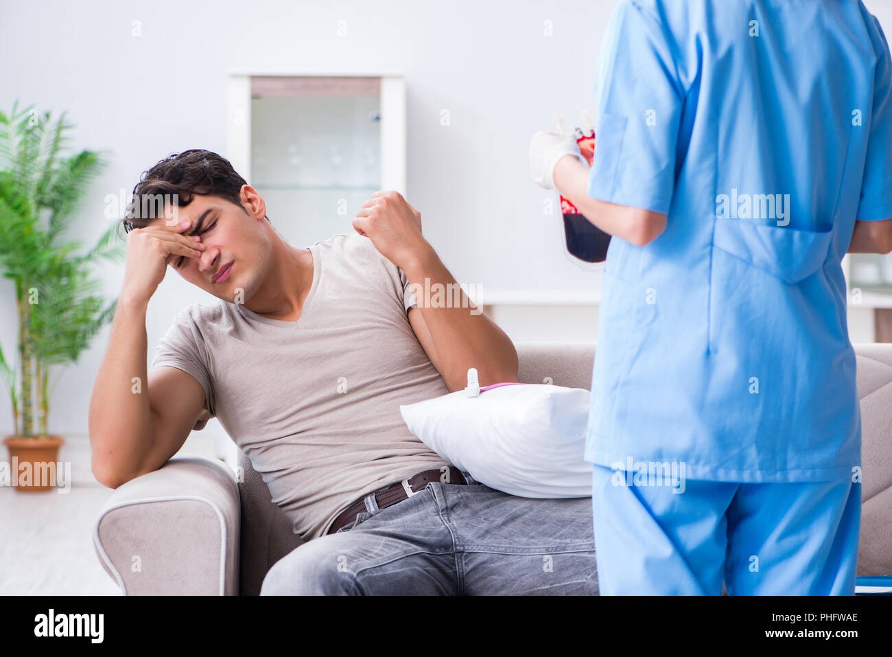 Patient getting blood transfusion in hospital clinic Stock Photo - Alamy