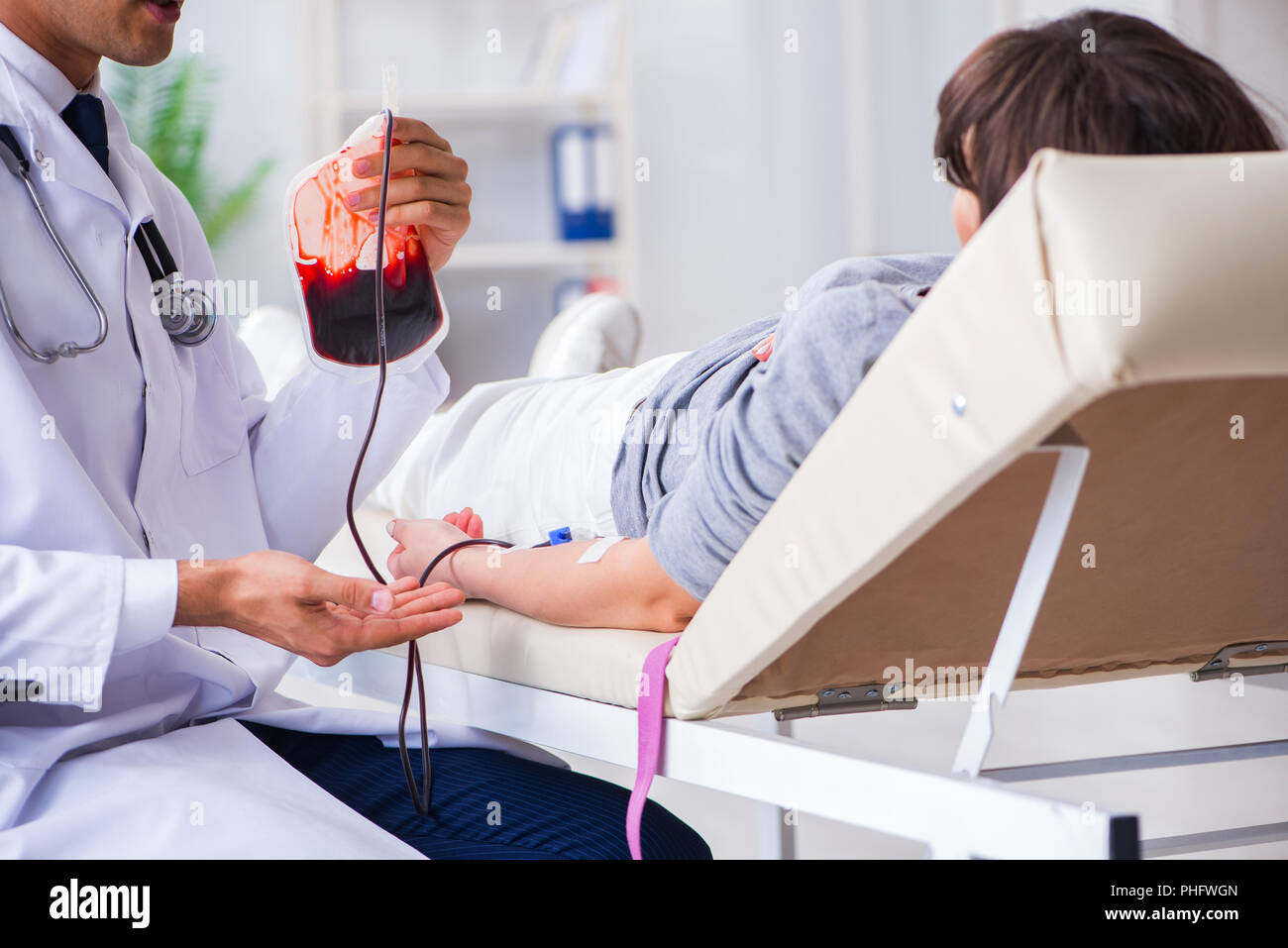 Patient getting blood transfusion in hospital clinic Stock Photo - Alamy