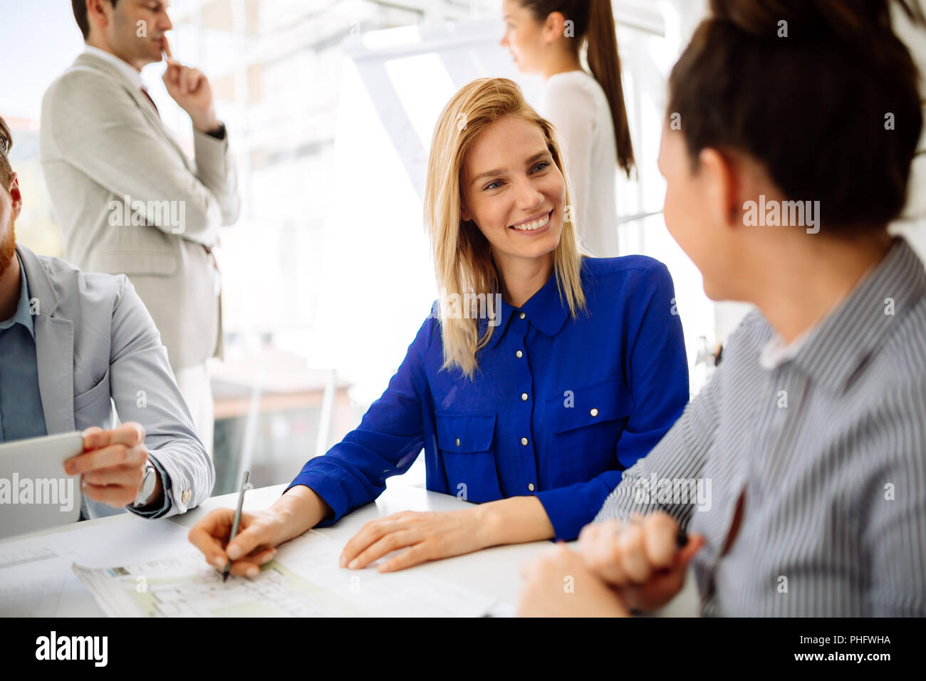 Employees working happy office hi-res stock photography and images - Alamy