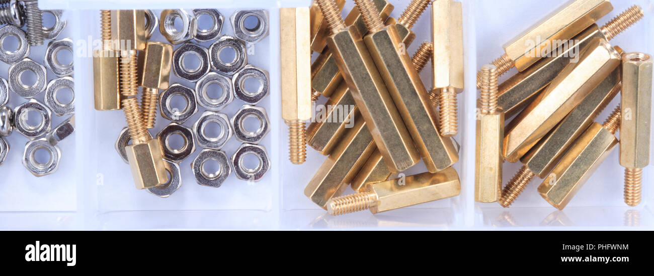 Brass Standoff Spacer Male and Female set in plastic container Stock ...
