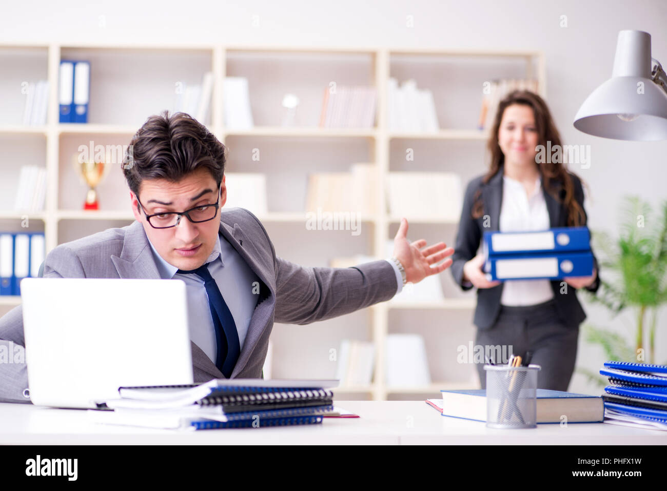 Angry boss unhappy with female employee performance Stock Photo - Alamy