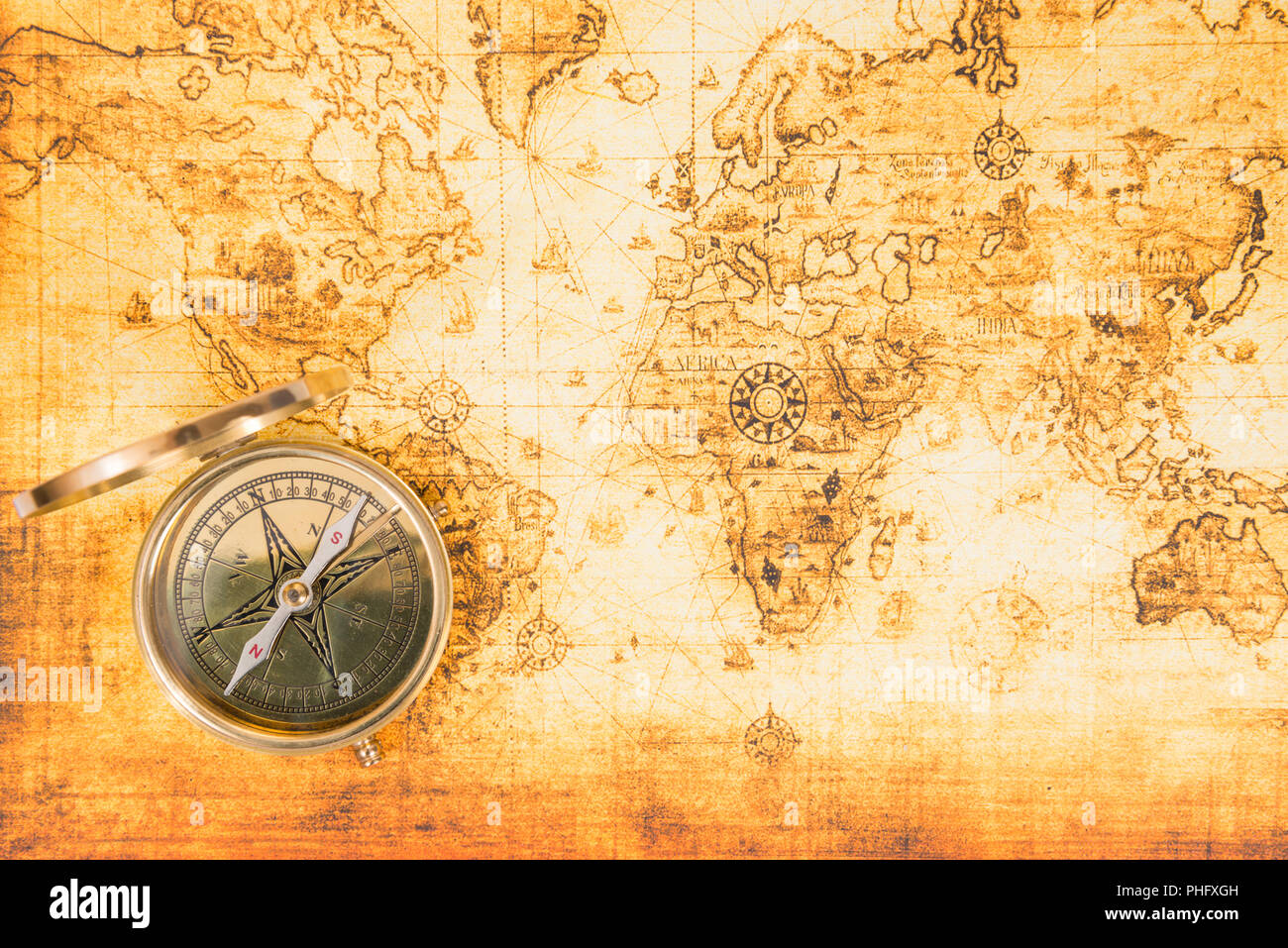 Old map with an ancient compass Stock Photo - Alamy