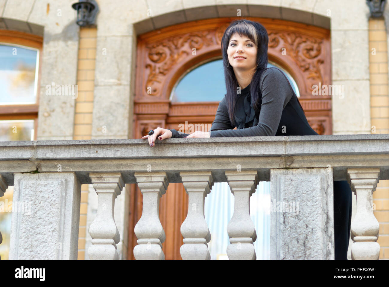 Person on balcony hi-res stock photography and images - Alamy