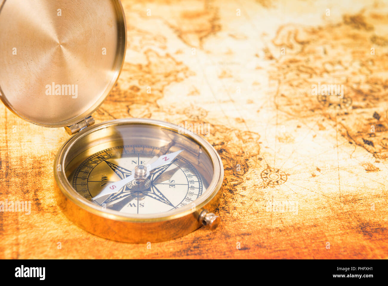 Old map with an ancient compass Stock Photo - Alamy