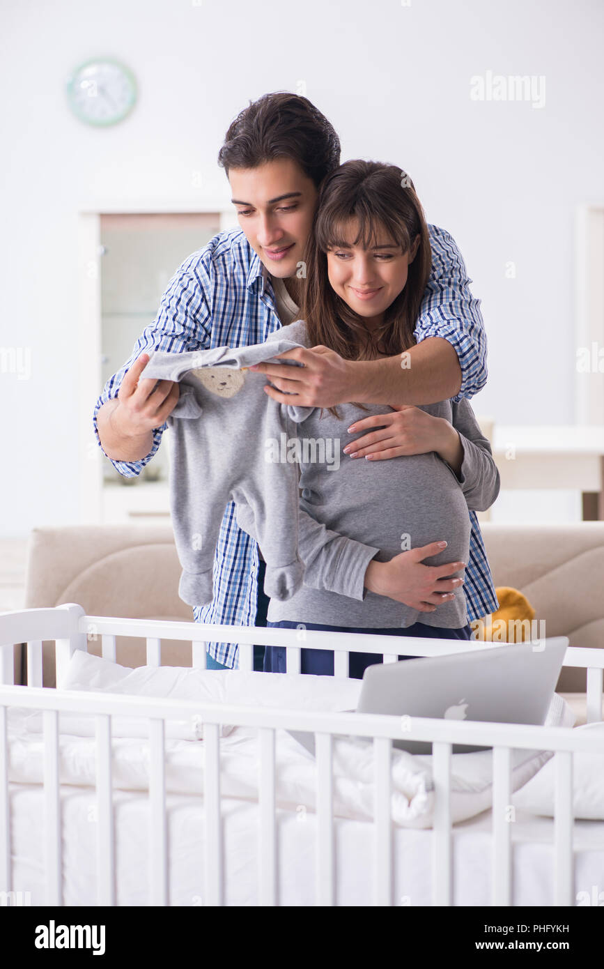 Young parents expecting their first baby Stock Photo - Alamy