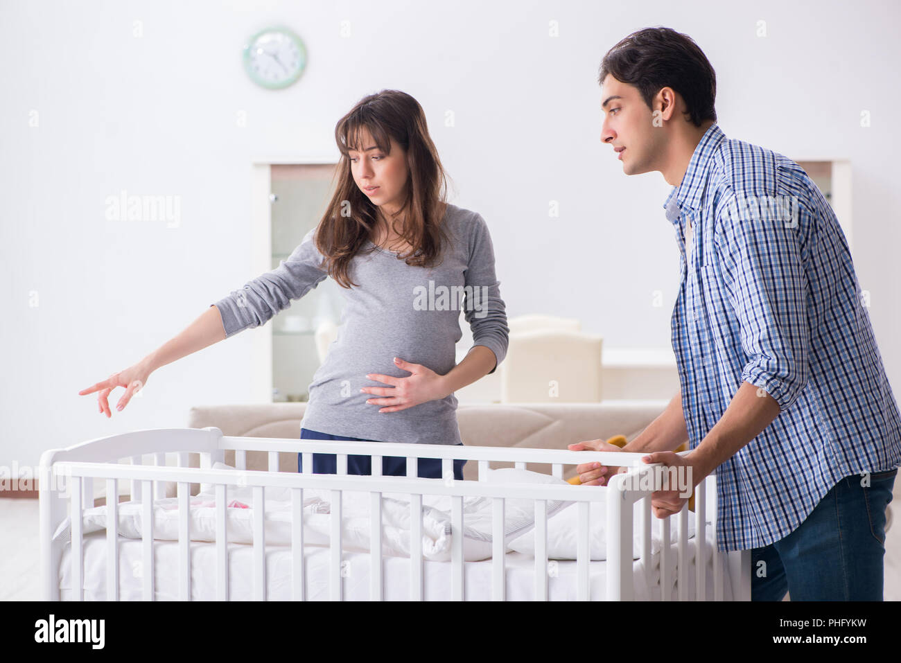 Young parents expecting their first baby Stock Photo - Alamy