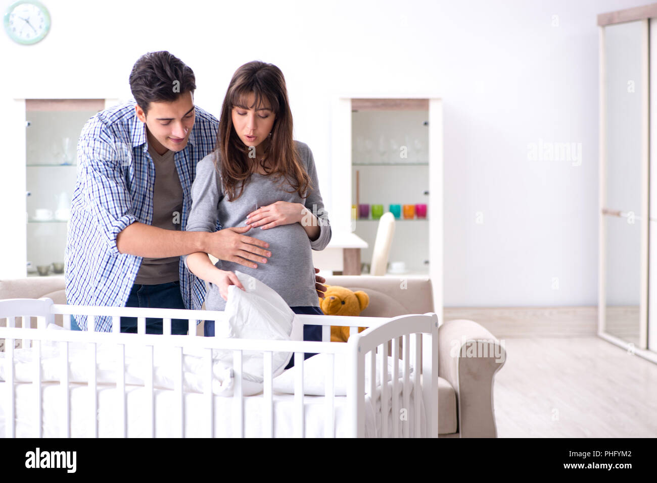 Young parents expecting their first baby Stock Photo - Alamy