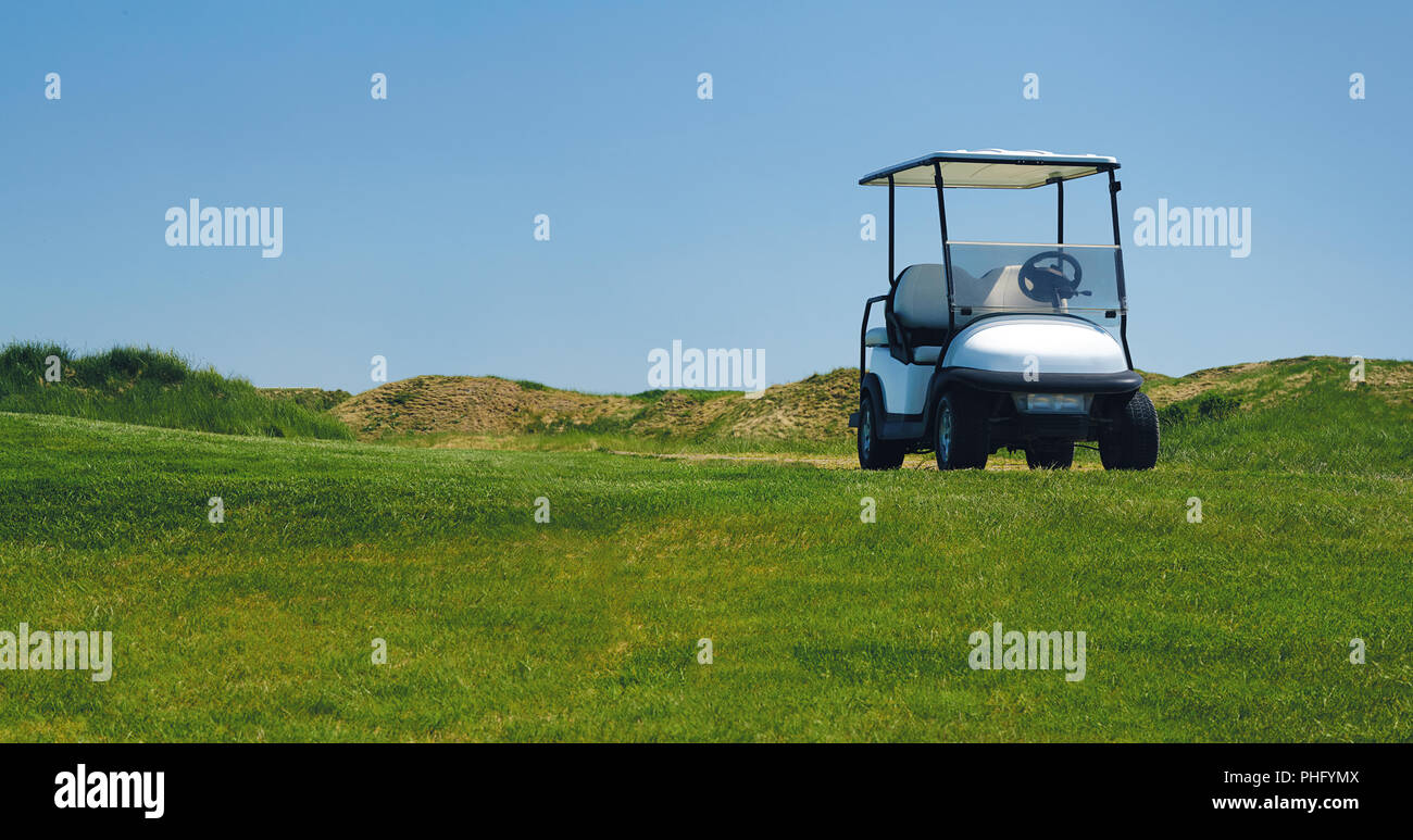 Golf car on the golf course Stock Photo - Alamy