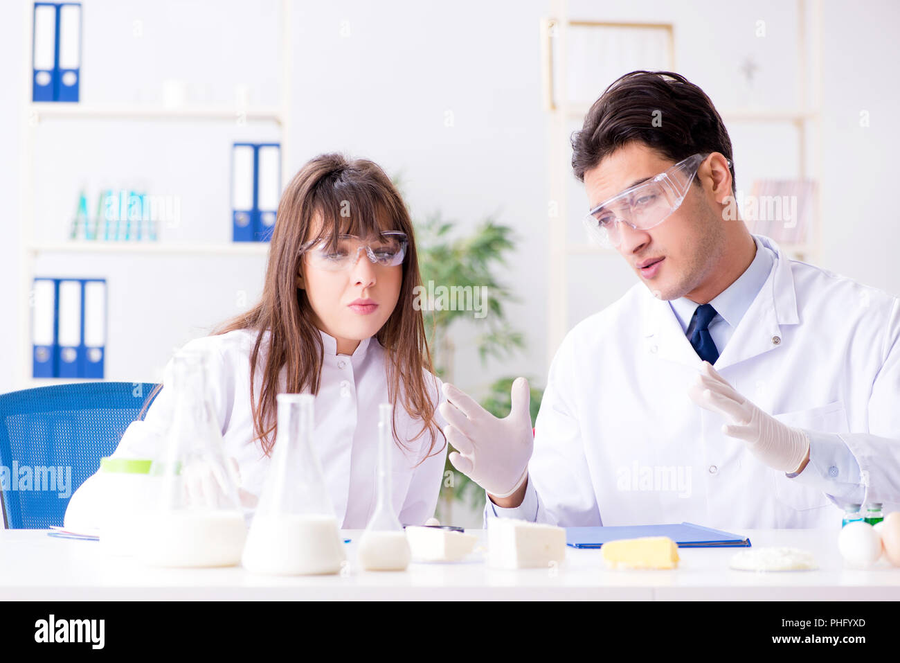 Two lab doctor testing food products Stock Photo - Alamy