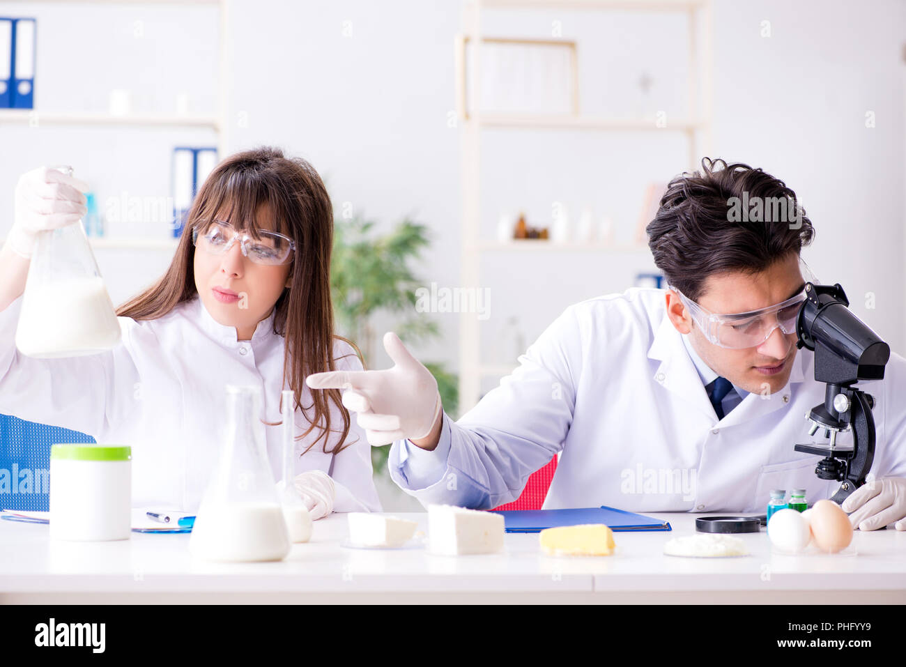 Two lab doctor testing food products Stock Photo - Alamy