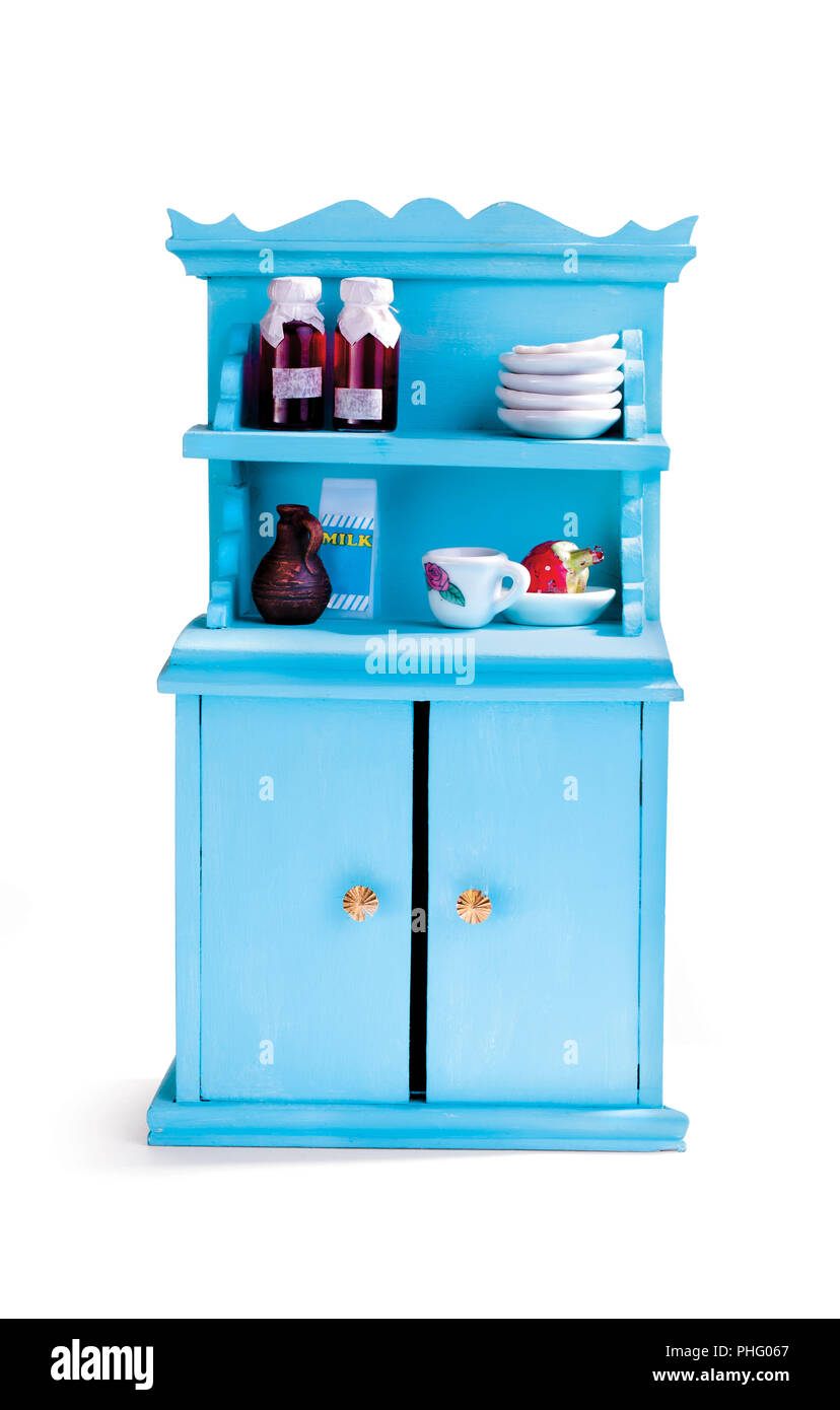 Miniature blue cupboard on white background Stock Photo - Alamy