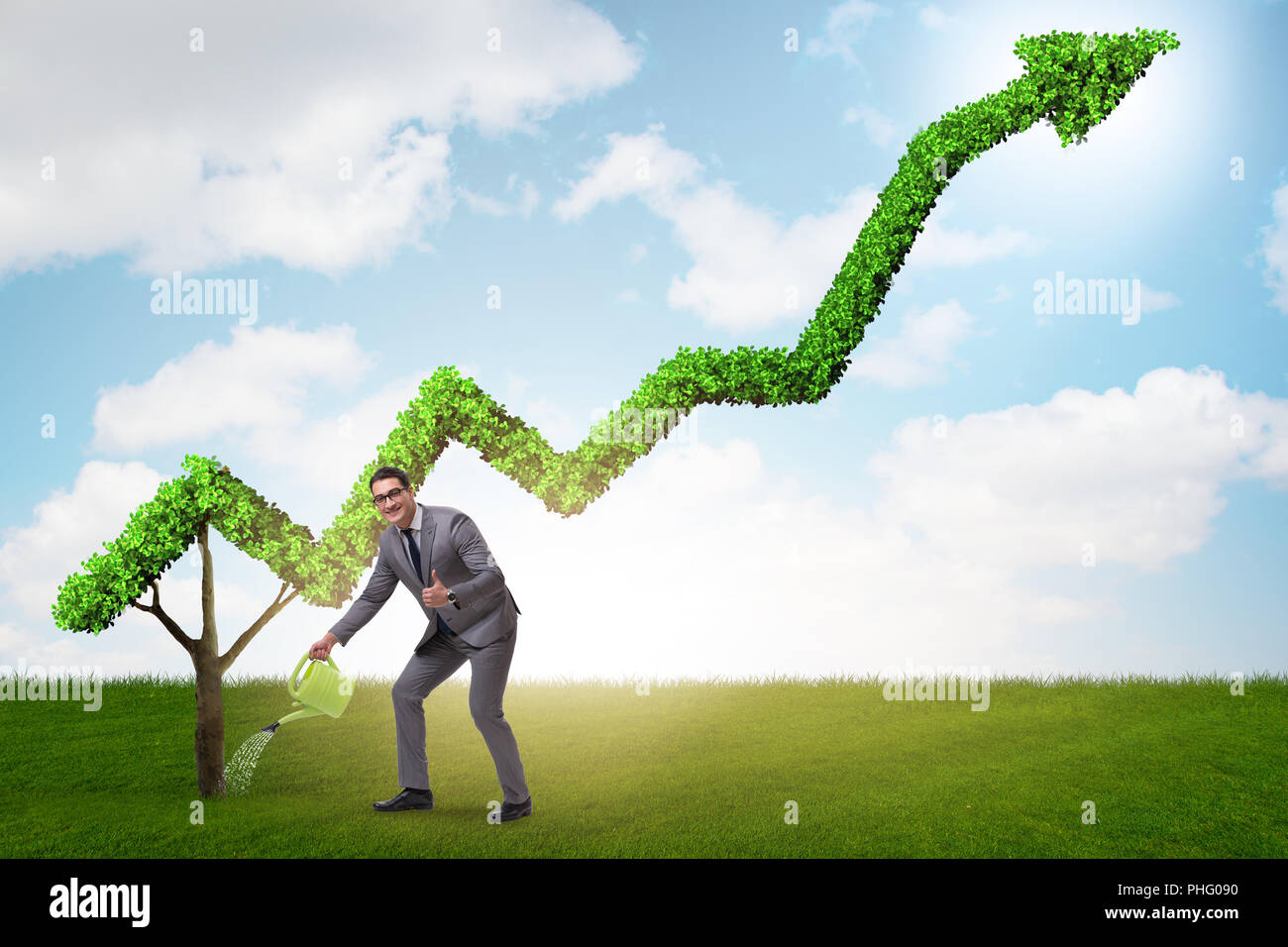 Businessman in investment concept watering financial line chart Stock ...