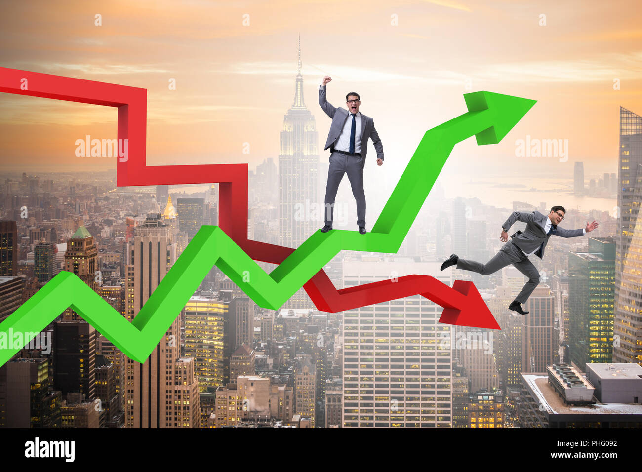 Businessman with charts of growth and decline Stock Photo - Alamy