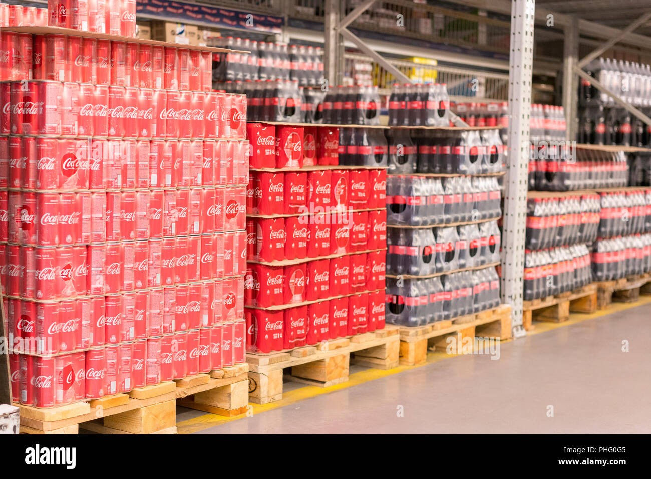 Kiev, Ukraine. August 28 2018. Coke in bottles on row of shelf display ...