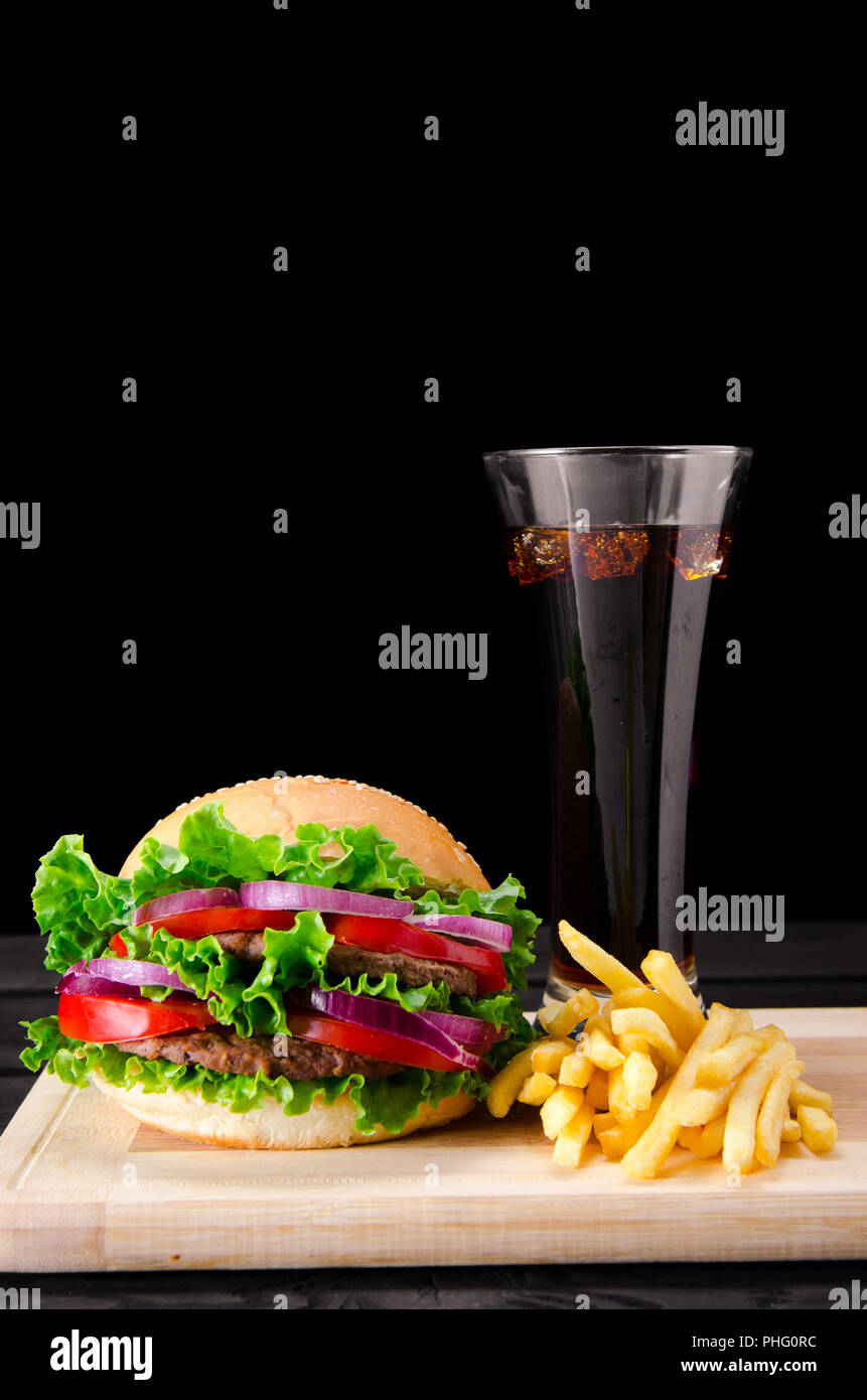 Burger served in bun in nutrition fast food concept Stock Photo - Alamy