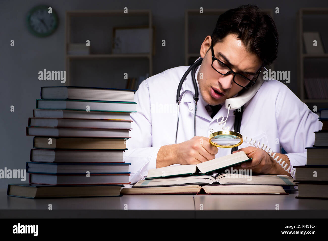 Medical student preparing for university exams at night Stock Photo - Alamy