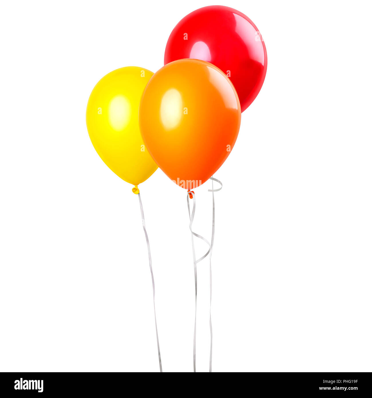 Group of balloons red, yellow orange isolated on a white background ...