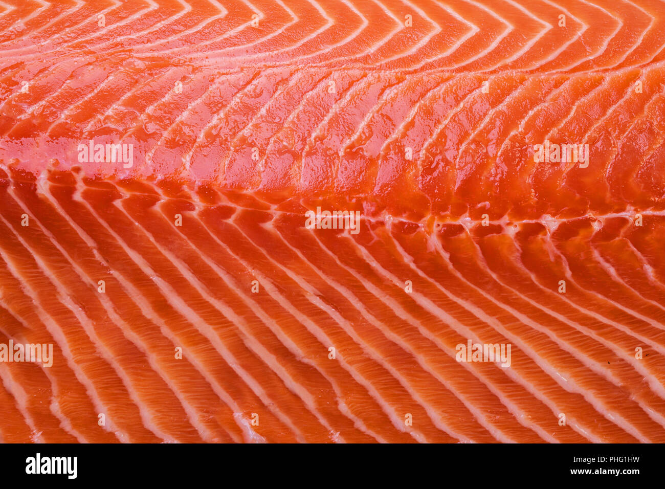 Texture of a beautiful fresh fillet of Norwegian salmon close-up Stock ...