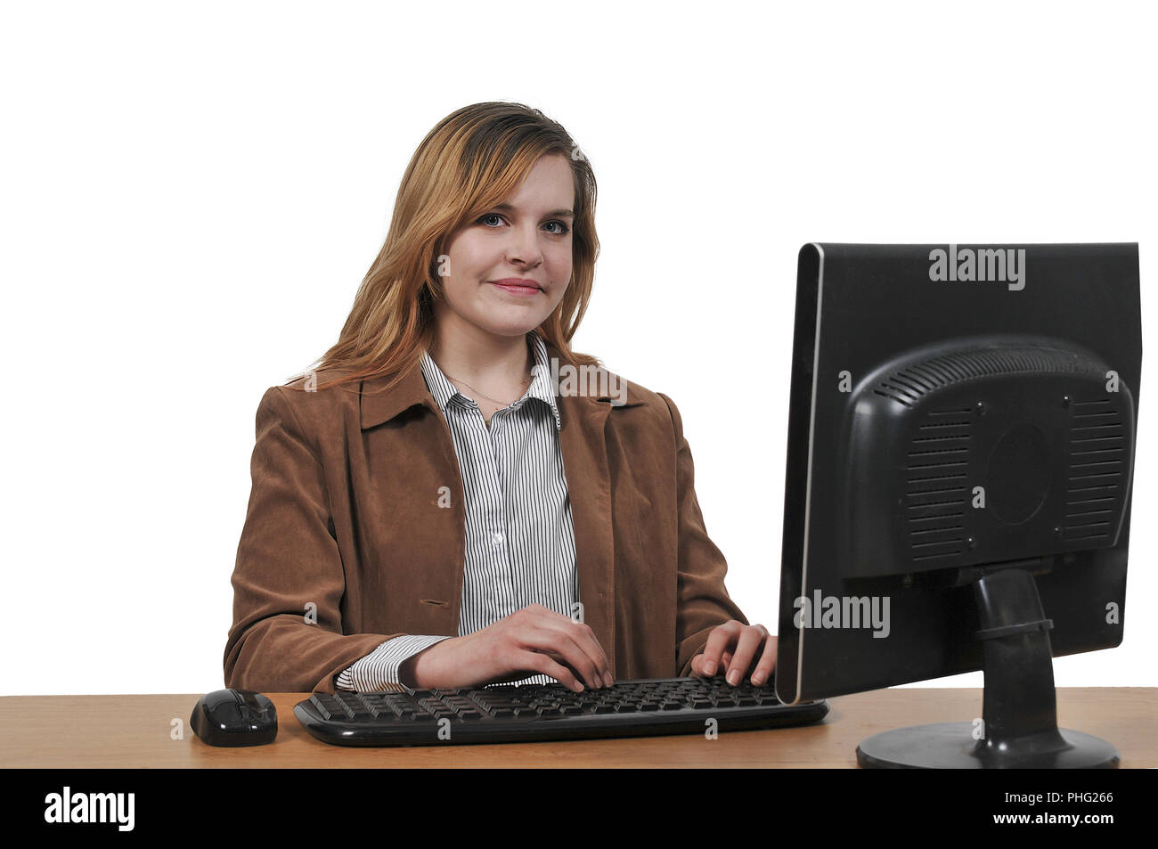 Woman on desktop computer Stock Photo - Alamy